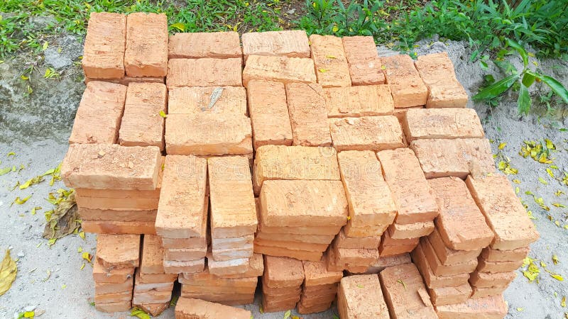 A Pile of Building Materials, Stack of New Red Bricks for Construction ...