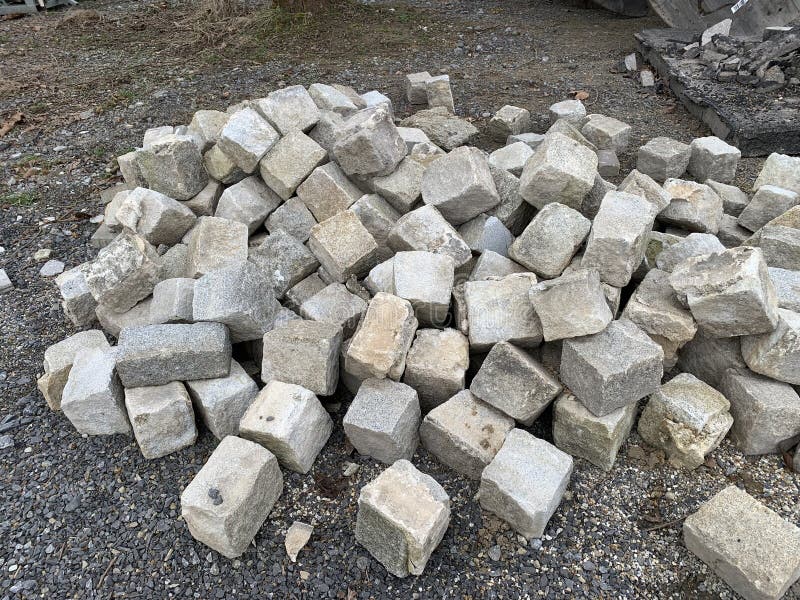 A Pile of Building Stones on a Construction Site. Paving Stones Stock ...