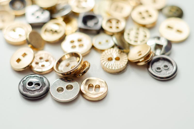 A Pile of Buttons of Various Shapes and Sizes Stock Photo - Image of ...