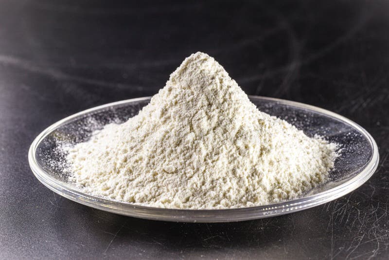 Cement Powder Pile on Isolated White Background with Metal Measuring ...