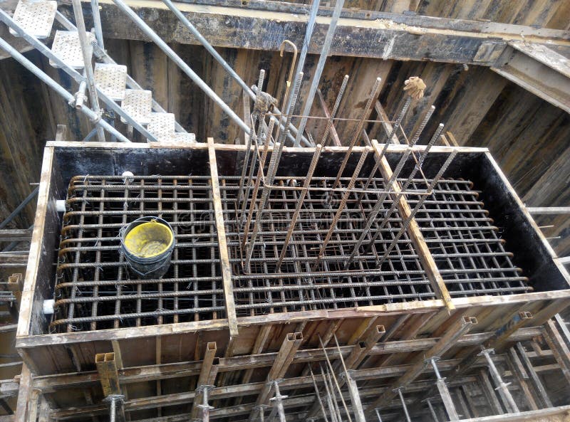 Pile Cap Reinforcement Bar Fabricated by Workers at the Construction ... Pile Cap Reinforcement Bar Fabricated by Workers at the Construction ...