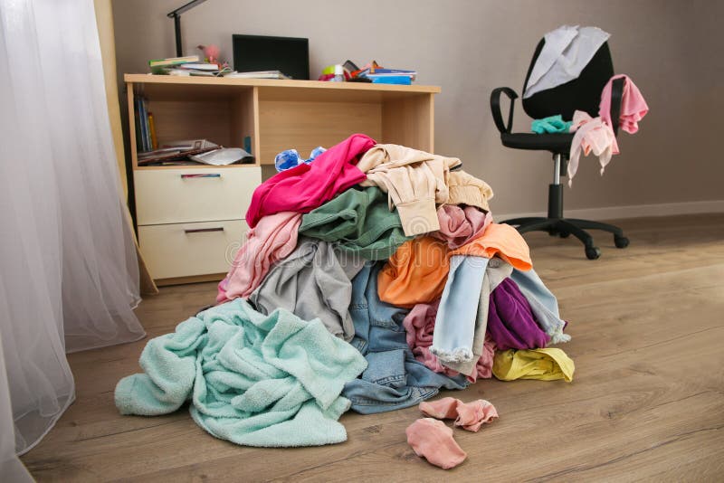 Pile of Carelessly Scattered Clothes on Floor Stock Photo - Image of ...