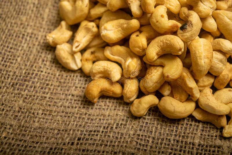 A Pile of Cashew Nuts on Burlap with a Rough Texture Surface Texture ...