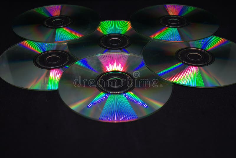 A pile of cd rom on black stock photo. Image of black - 219148412