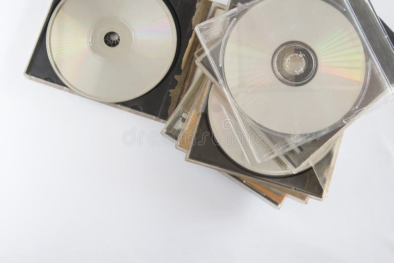 A pile of CDs and DVDs stock photo. Image of graphic - 194861252