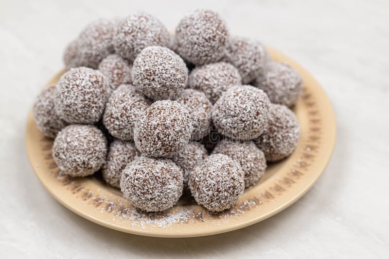 Pile of Chocolate Balls with Coconut on the Plate Stock Image - Image ...