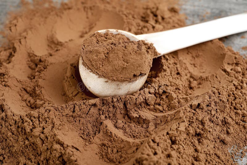 Pile of Chocolate Protein Powder and Scoop on Grey Table Stock Image ...