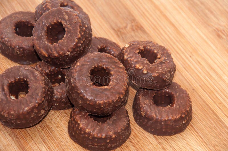 Pile of Chocolate Round Cookies with Hole in the Center Stock Photo ...