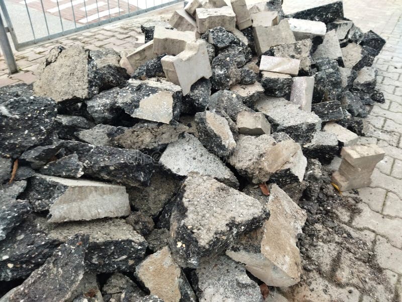 A Pile of Chunks of Chained Concrete Stock Photo - Image of street ...