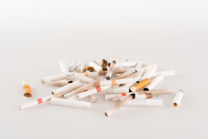 Pile of Cigarette Ends on White Stock Image - Image of plenty, nicotine ...