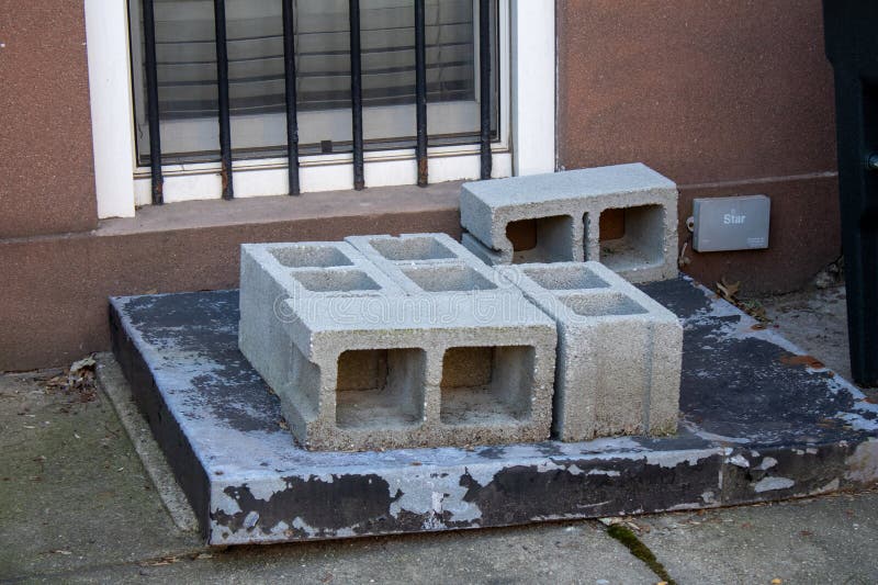 Pile of Cinder Blocks in Front of a Structure Stock Photo - Image of ...
