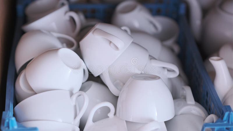 Pile of Clean White Cups in Plastic Box. Close Up. Stock Video - Video ...