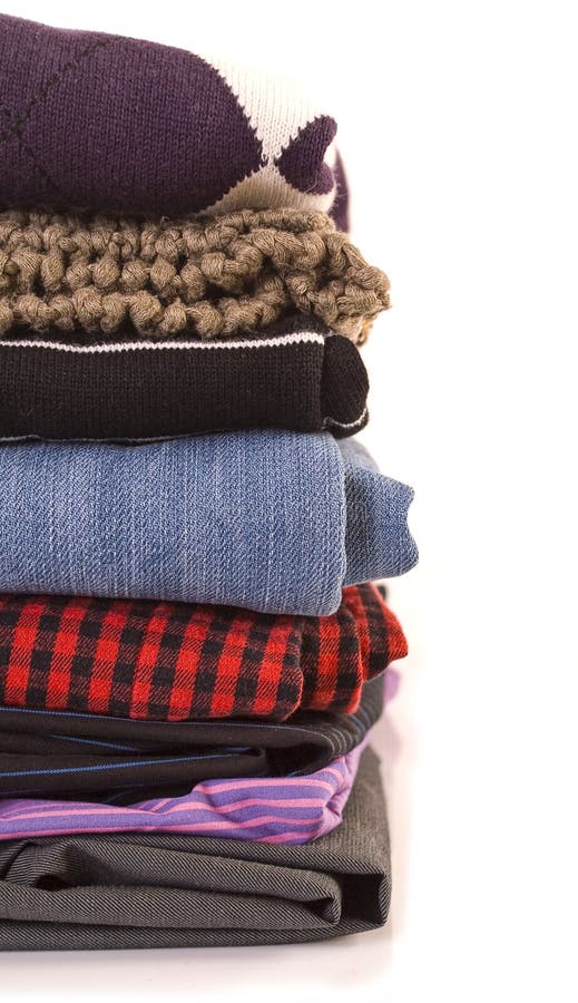 Pile of Knitted Winter Clothes and Wool Sweaters on Wooden Background ...
