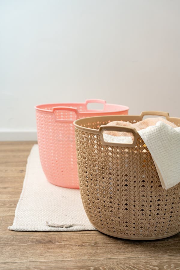 Pile of Clothes in Plastic Laundry Basket in the Bathroom Stock Photo ...