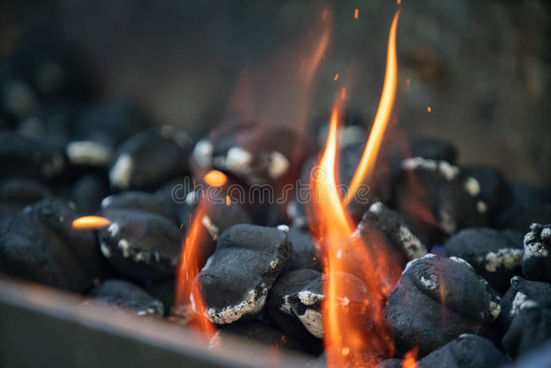 Pile of Coal Brickets Burning Stock Image - Image of burning, pile ...
