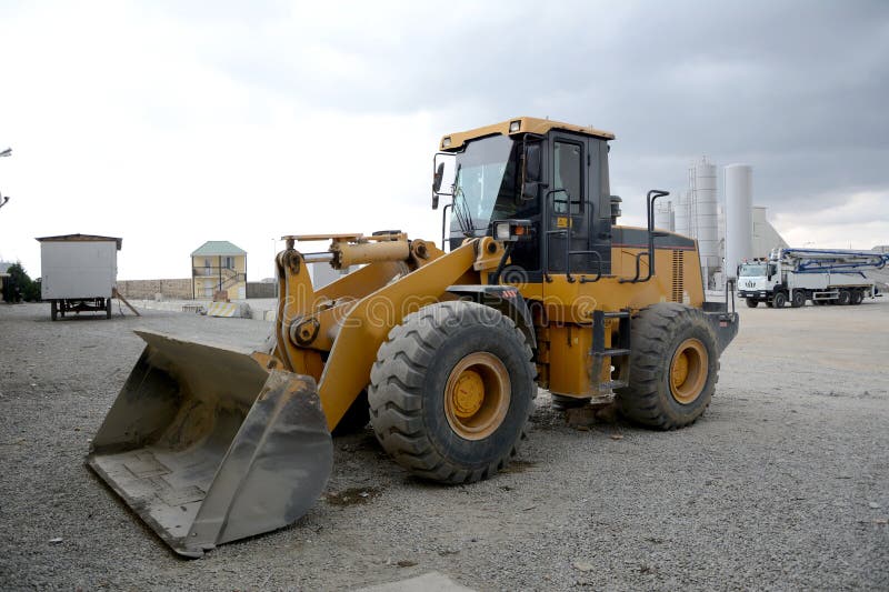 A Pile of Coal Ore with a Front End Loader Stock Image - Image of ...