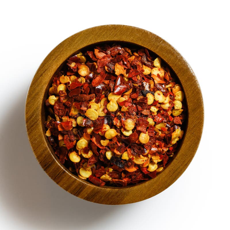 A Pile of Coarsely Ground Chilli Peppers Isolated on White. Stock Photo ...