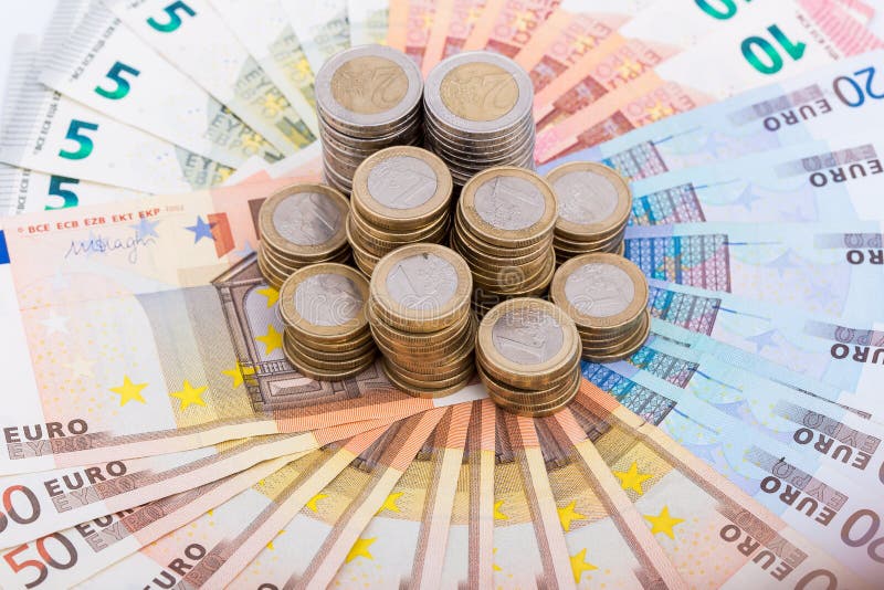 A Pile of Coins on Bank Notes Stock Image - Image of financial, invest ...