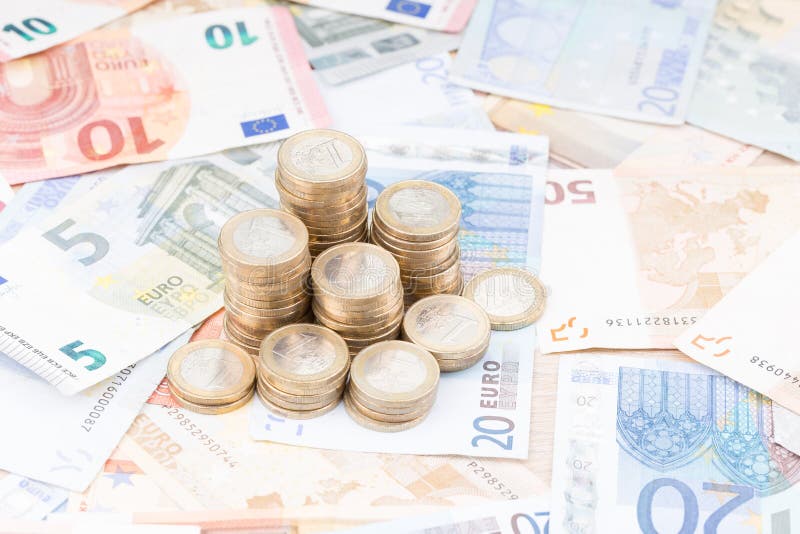 Pile of Coins on Bank Notes Stock Photo - Image of cash, notes: 67979246