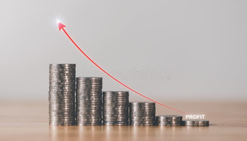 Pile of Coins and a Graph Showing an Increase in Profits,and Business ...