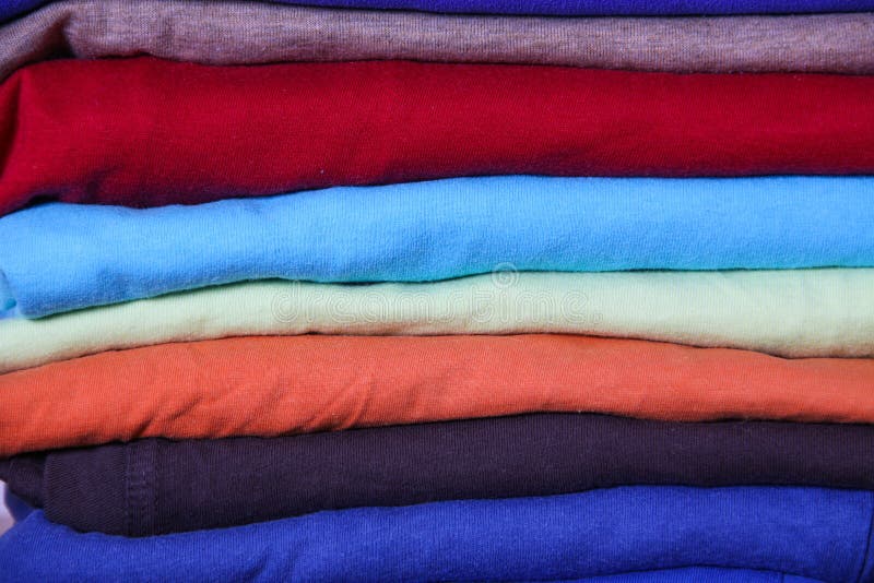Pile of colorful clothes stock image. Image of folded - 39927025