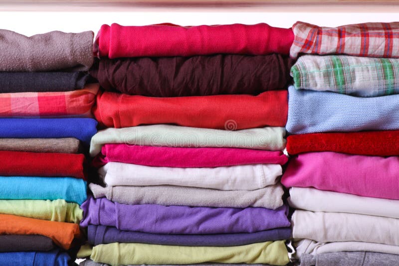 Pile of colorful clothes stock image. Image of folded - 39927025