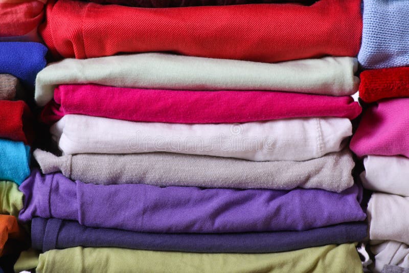 Pile of colorful clothes stock photo. Image of closeup - 39961718