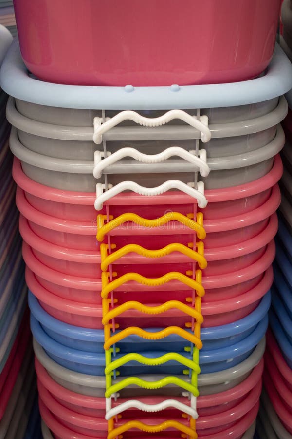 Pile of Colorful Plastic Boxes with Holders in a Market Stock Photo ...