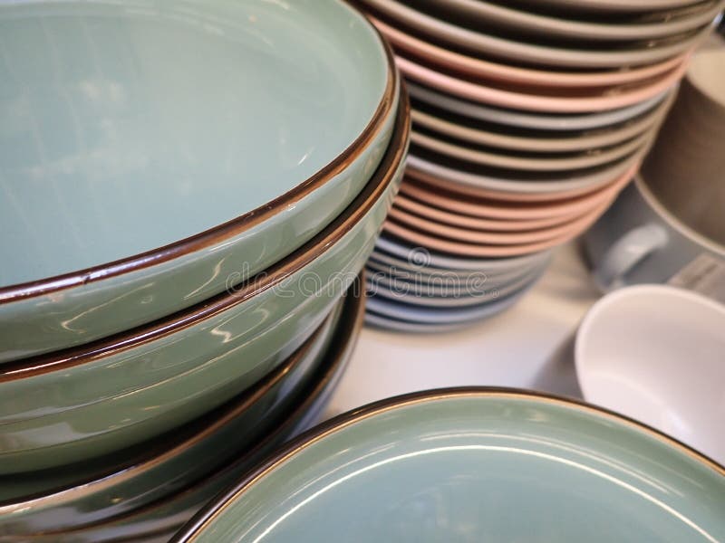 Pile of Colorful Plates in Kitchen Stock Image - Image of cutlery ...