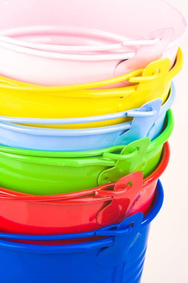 Coloured Buckets on the Floor Stock Photo - Image of trash, green: 8105718