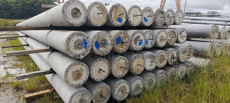 Pile of Concrete Electric Poles for Medium Voltage Distribution Stock ...
