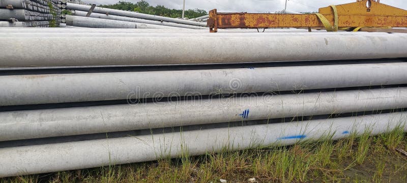 Pile of Concrete Electric Poles for Medium Voltage Distribution Stock ...
