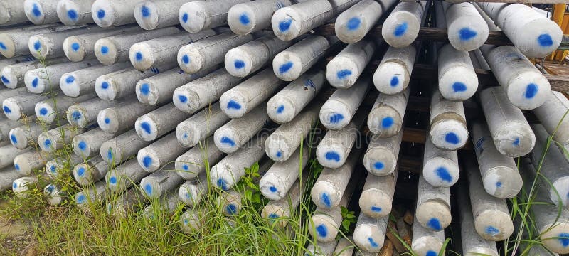 Pile of Concrete Electric Poles for Medium Voltage Distribution Stock ...