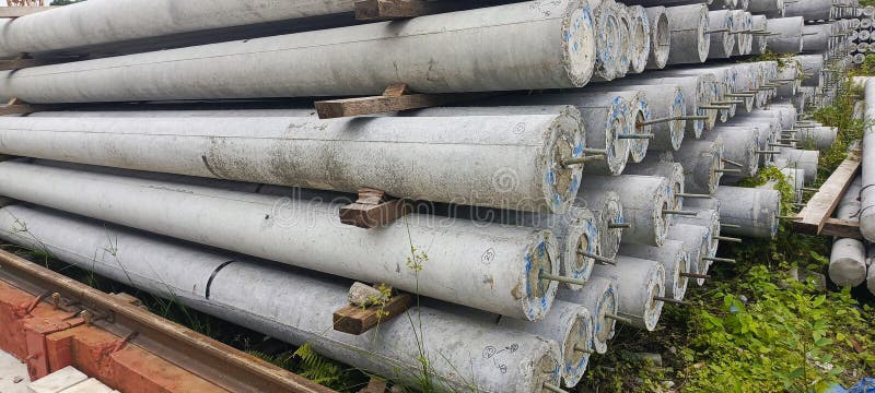 Pile of Concrete Electric Poles for Medium Voltage Distribution Stock ...