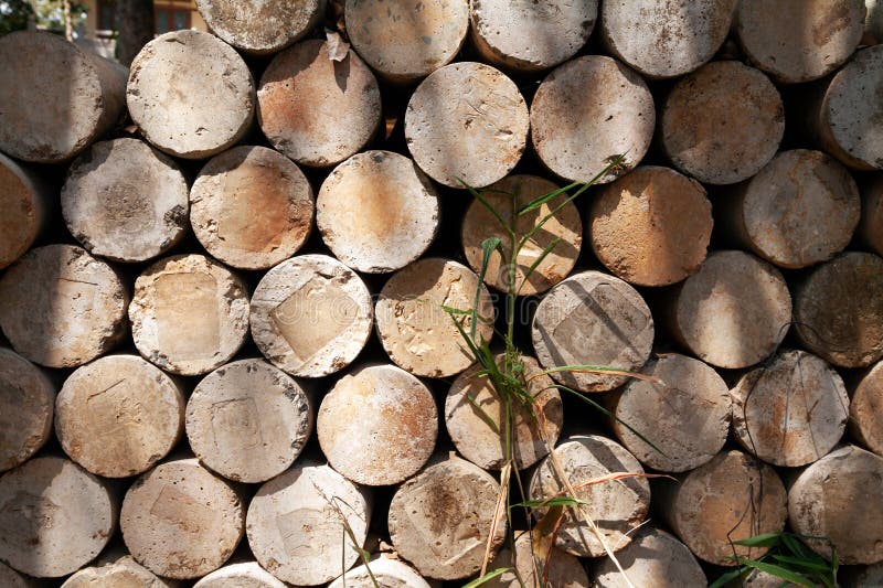 Pile of Concrete Piers for Foundation Repair Stored Outdoors, at a ...