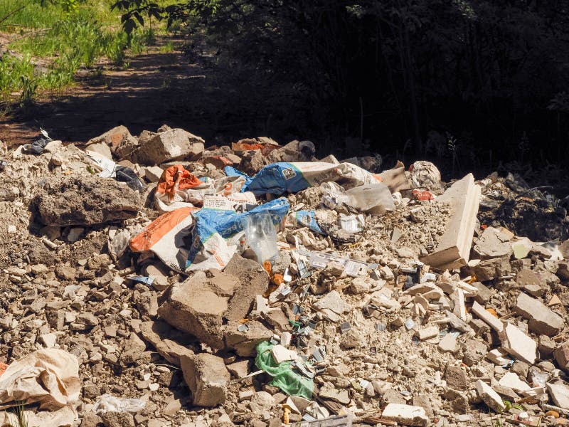 A Pile of Construction Debris on the Street Stock Photo - Image of ...