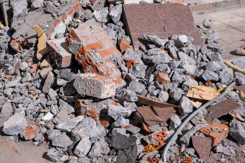 Broken Bricks, Pieces of Concrete and Granite Tiles on the Ground after ...