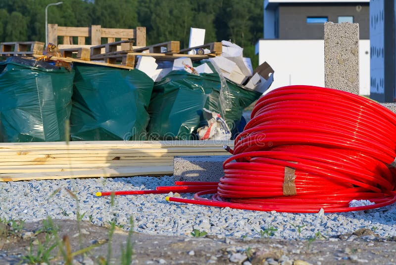 Construction Waste in Front of an Unfinished Building. Rubbish in Front ...