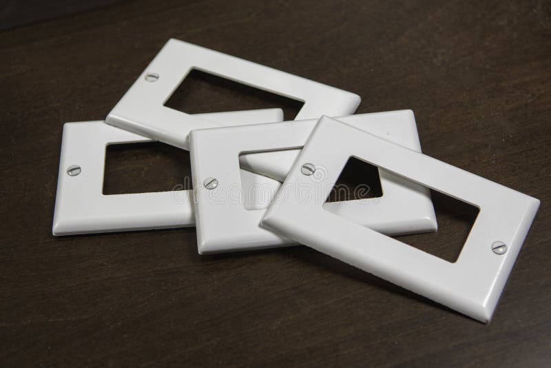 Pile of Covers for Electrical Sockets on the Table Stock Photo - Image ...
