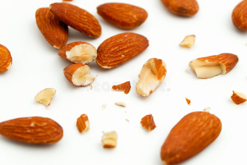 Crack Broken Cut in Half Almond Nuts on White Surface Stock Photo ...