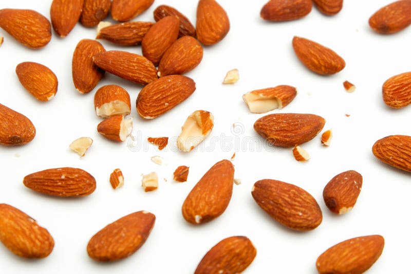 Crack Broken Cut in Half Almond Nuts on White Surface Stock Photo ...