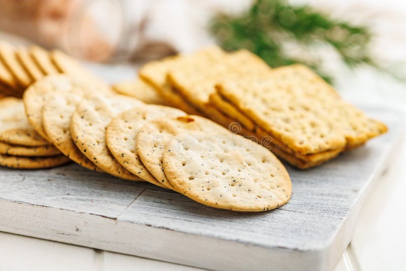 A Pile of Crackers on a Table Stock Photo - Image of delicious, wheat ...