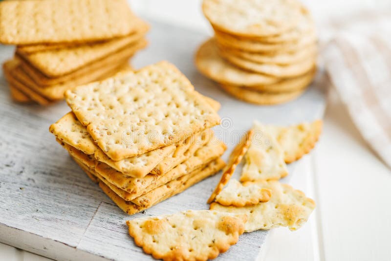 A Pile of Crackers on a Table Stock Photo - Image of organized, saltine ...