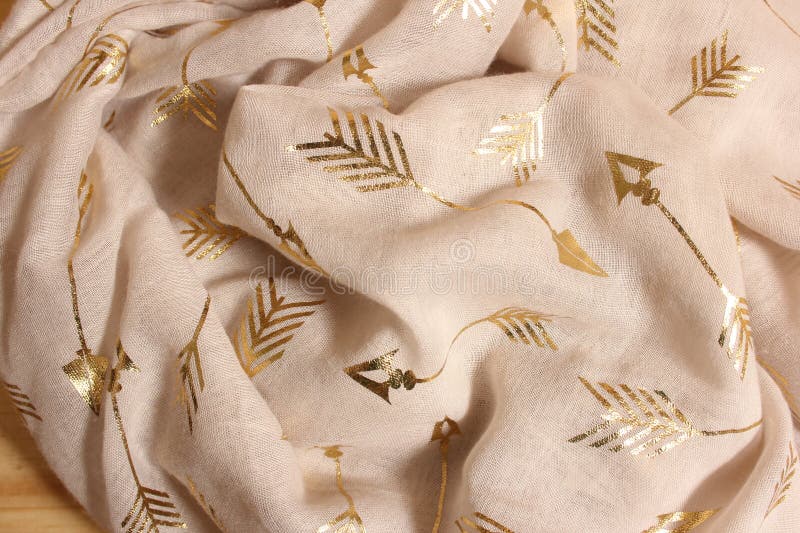Pile of Cream Colored and Gold Chiffon Fabric Overhead View Stock Image ...