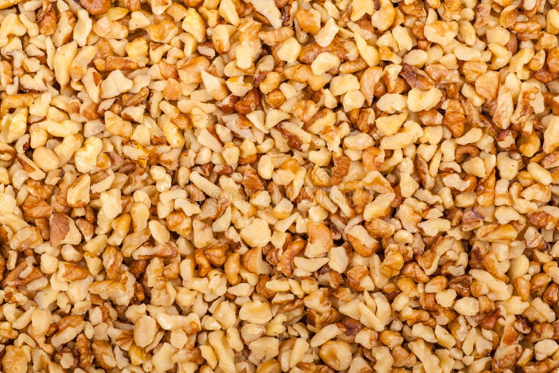 Pile of crushed walnut stock image. Image of processing - 105300173