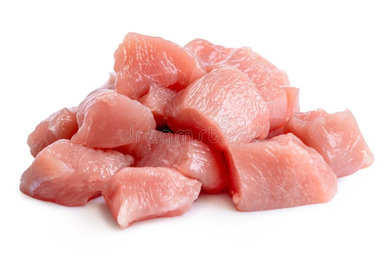 A Pile of Cut Up Uncooked Boned Chicken Breast Isolated on White Stock ...