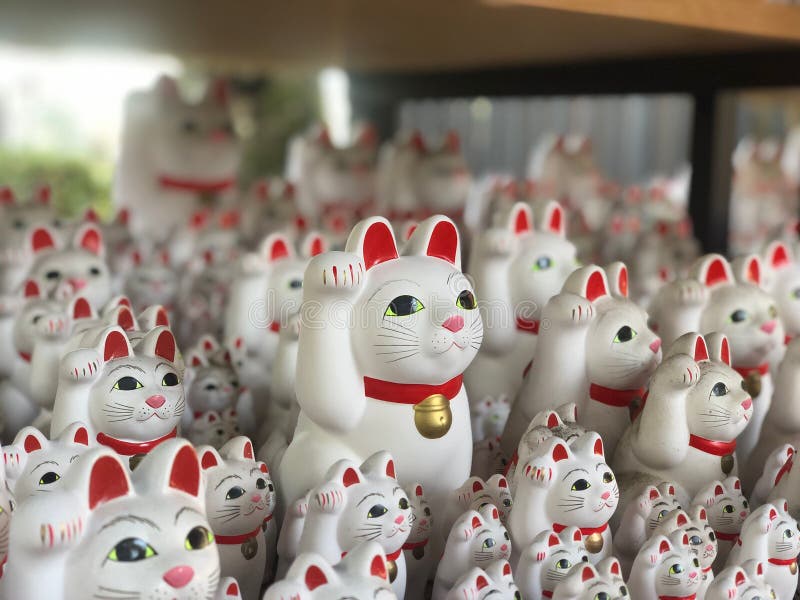 Pile of Cute Japanese Maneki Neko Cat Figurines of Different Sizes ...
