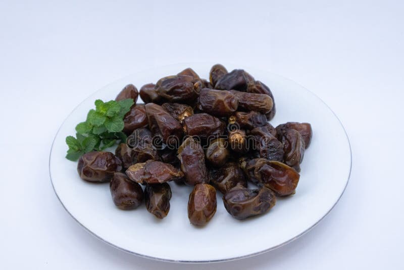 Pile of Dates with Green Leaf Garnish Stock Image - Image of ramadan ...