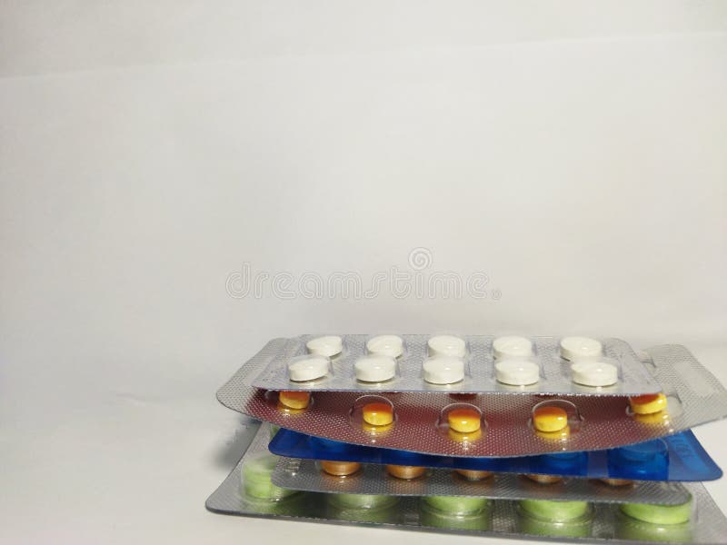 Pile of Different Color and Shape Tablets Strips, Isolated Stock Image ...