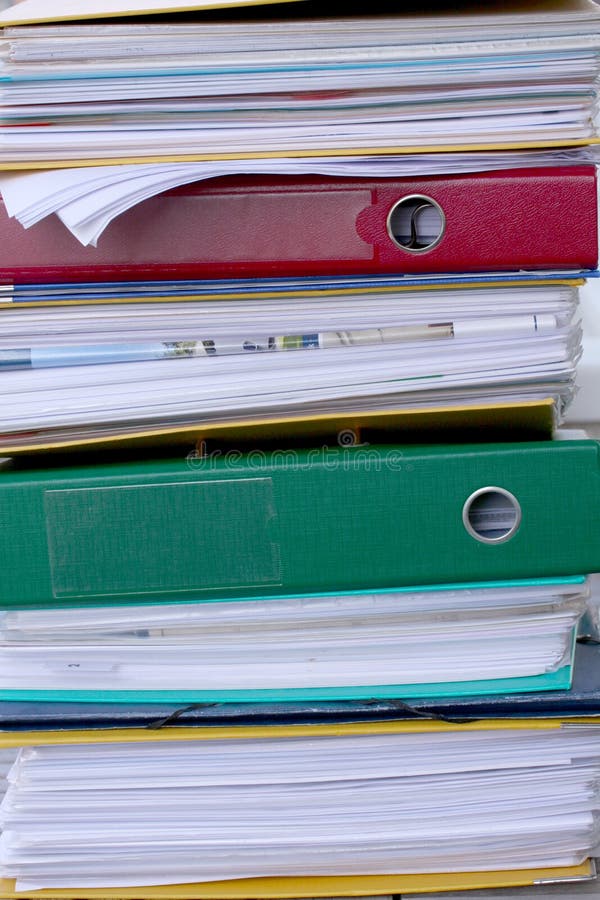 Pile of Different File Folders or Ring Binders Full with Office ...